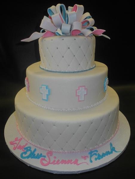 Religious Fondant Ivory Cake with Pink and Blue Decorations and Bow ...